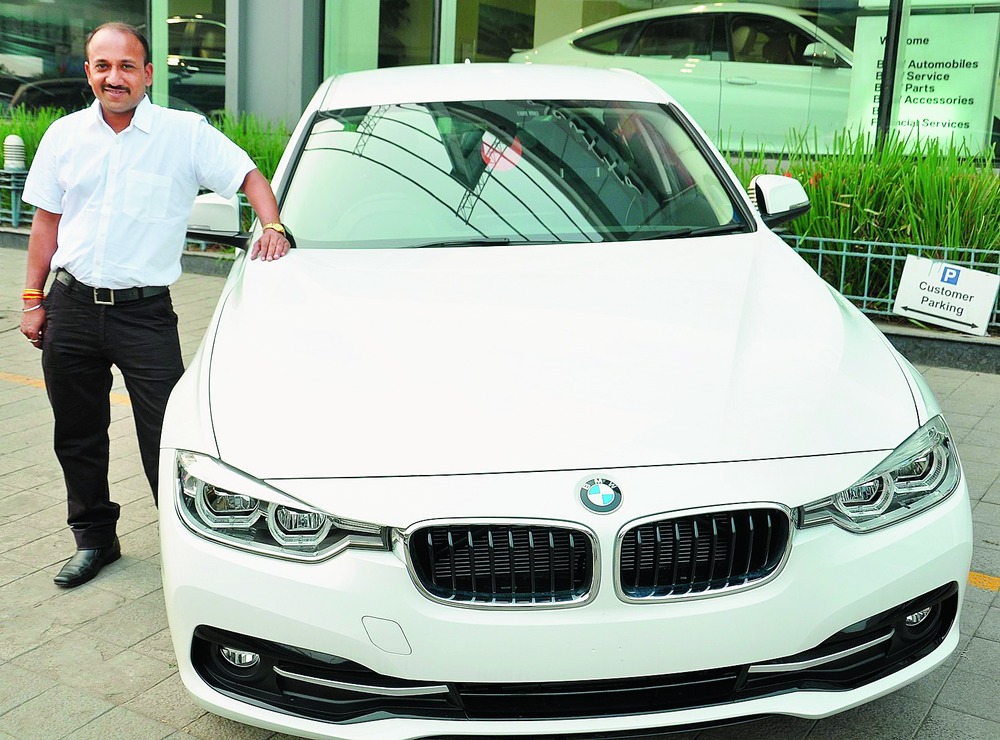 BMW 3 reward for five-star cabbie with drive - Telegraph India