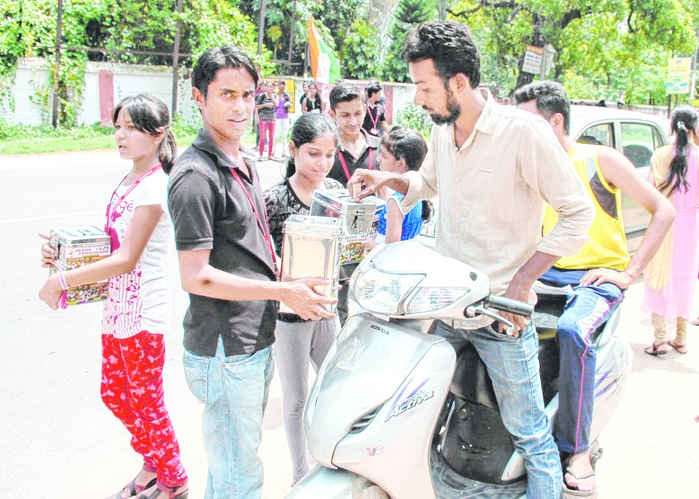 'Begging' boxes out for education - Telegraph India