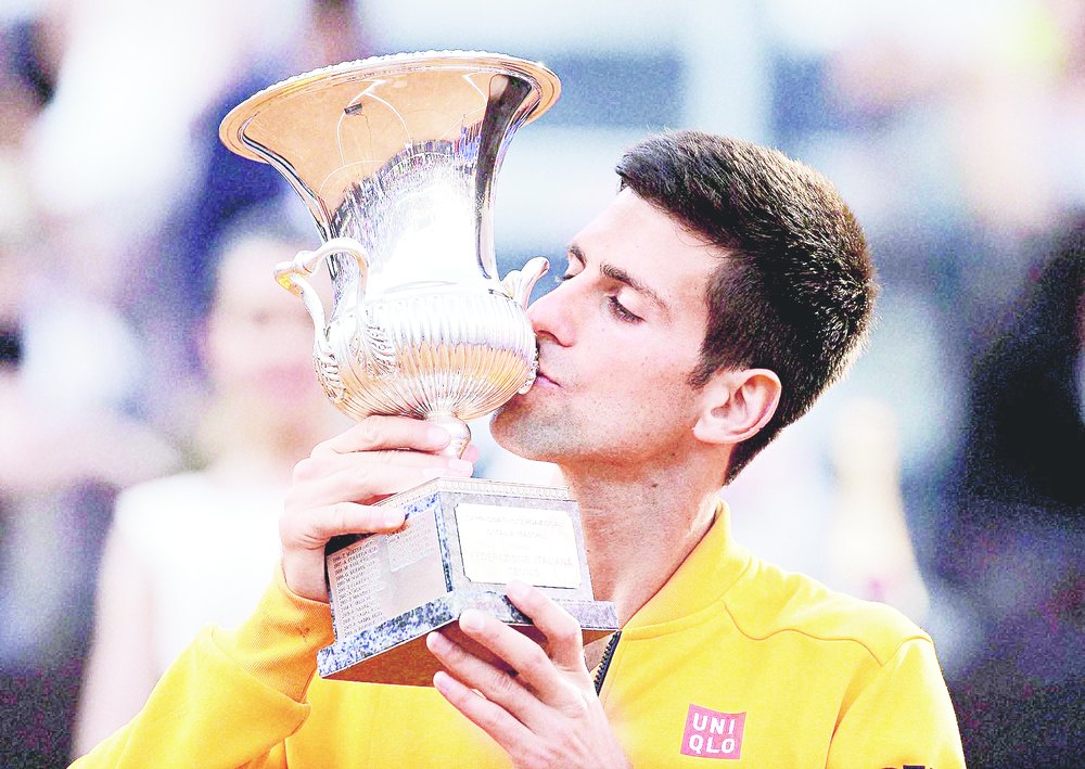 Novak tames Roger in final; Maria wins - Telegraph India