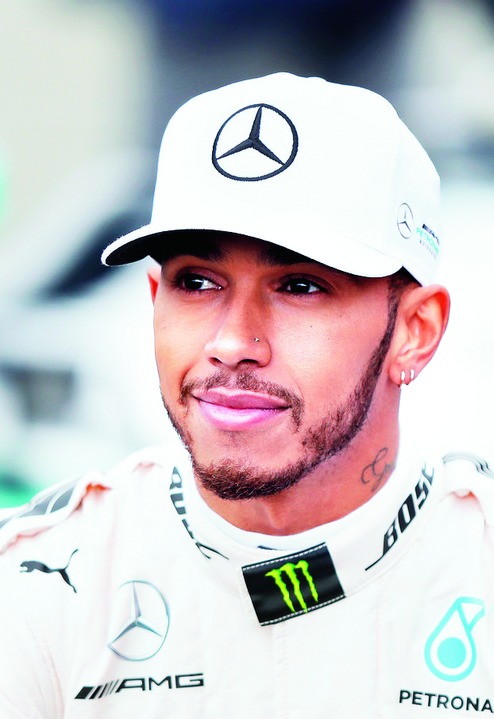 Lewis aims to wipe 'smile' off Seb's face - Telegraph India